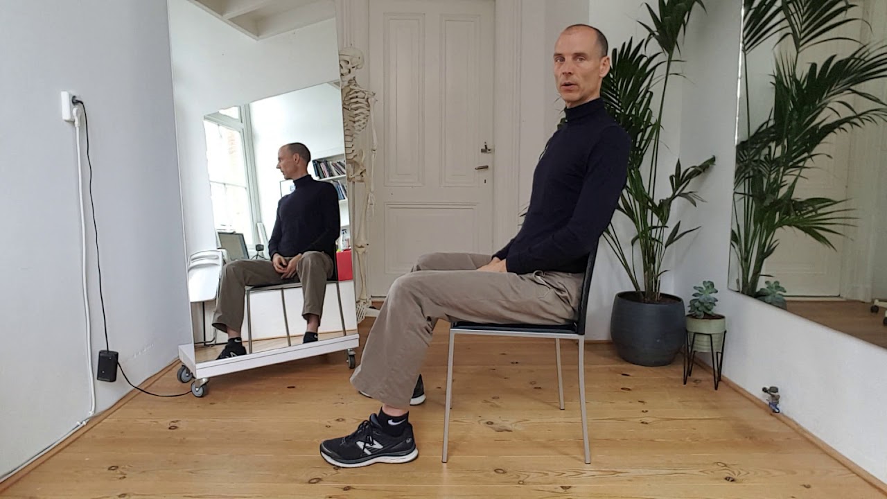 Leaning back in a chair with good posture and minimal tension - YouTube