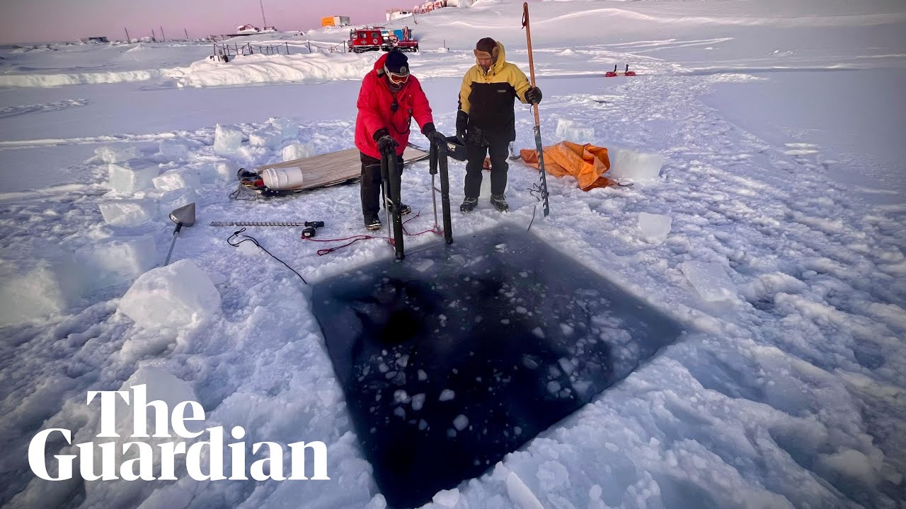 Antarctic researchers mark winter solstice with icy swim - YouTube