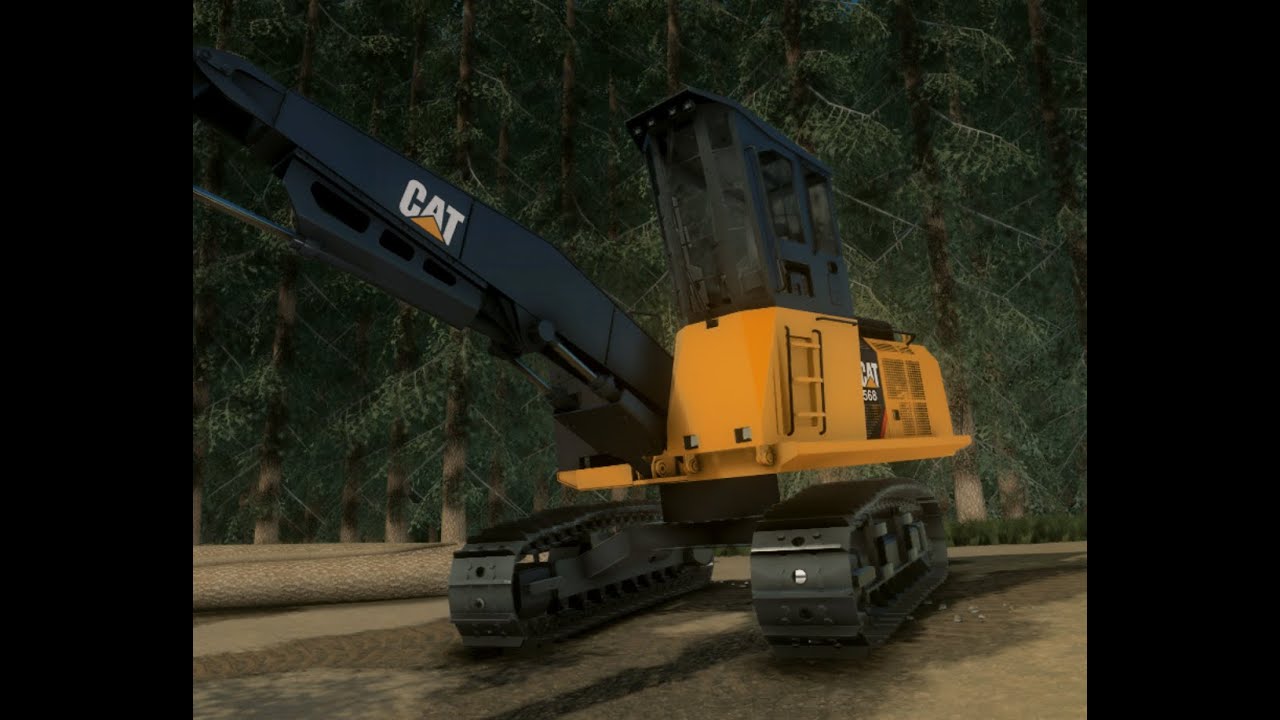 cat 568 klm loading a truck - YouTube