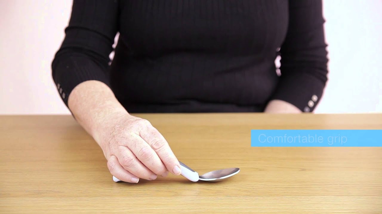 M80038 Adult Kura Care R Hand Angled Spoon - YouTube