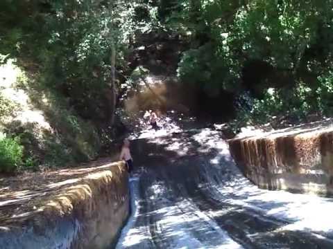 Sliding Down The Mill Creek Dam - YouTube