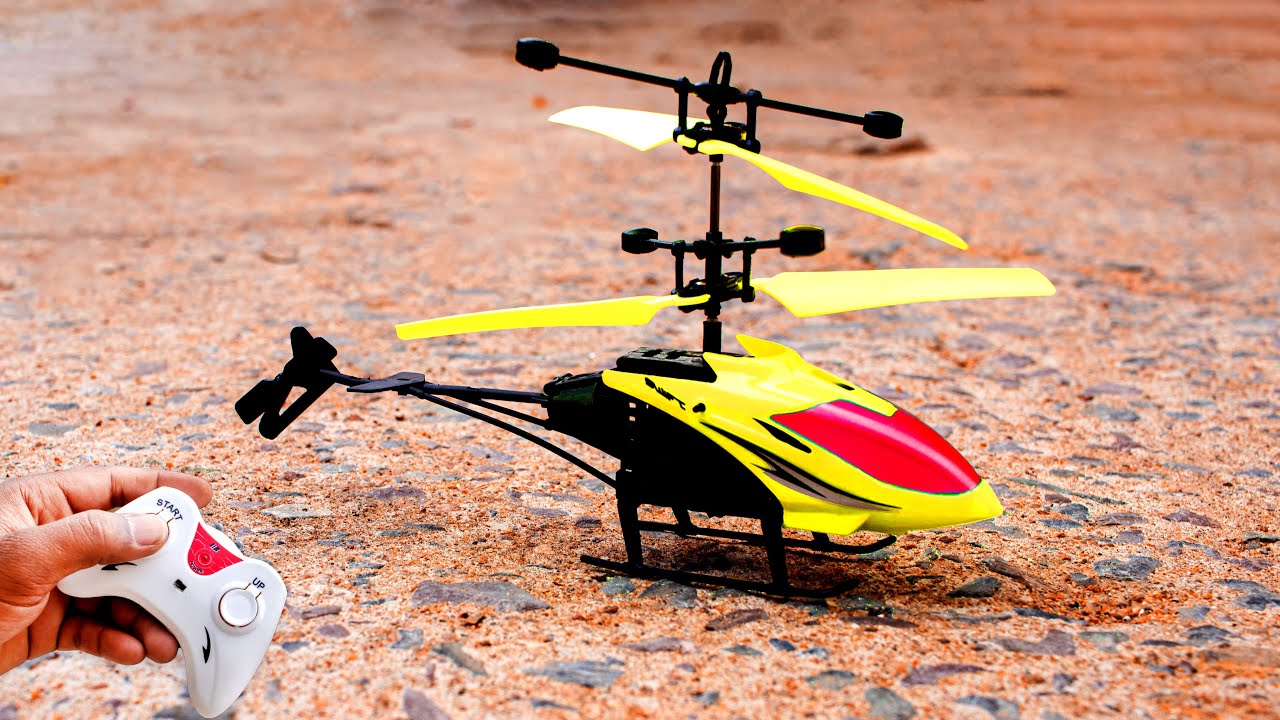 Yellow color Exceed Helicopter Dual mode control flight Unboxing and ...