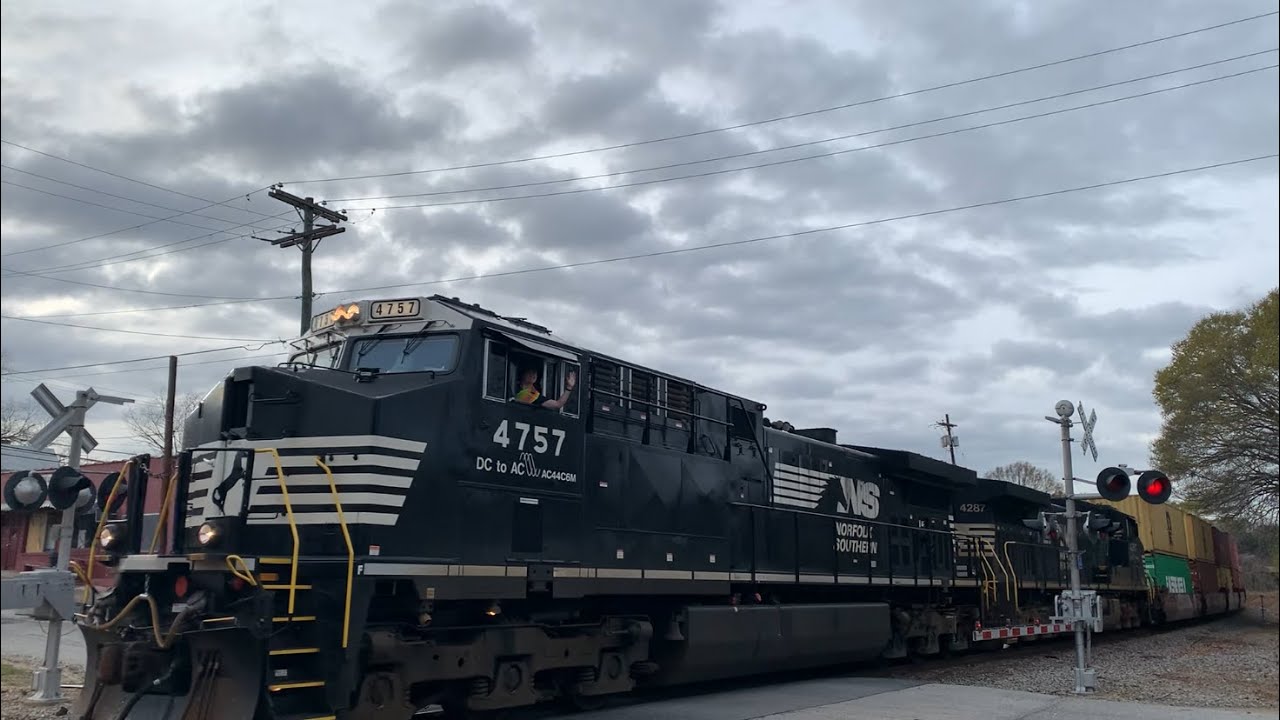 NS 296 rolls through Jonesville, SC with Conductor Gibbs giving his ...