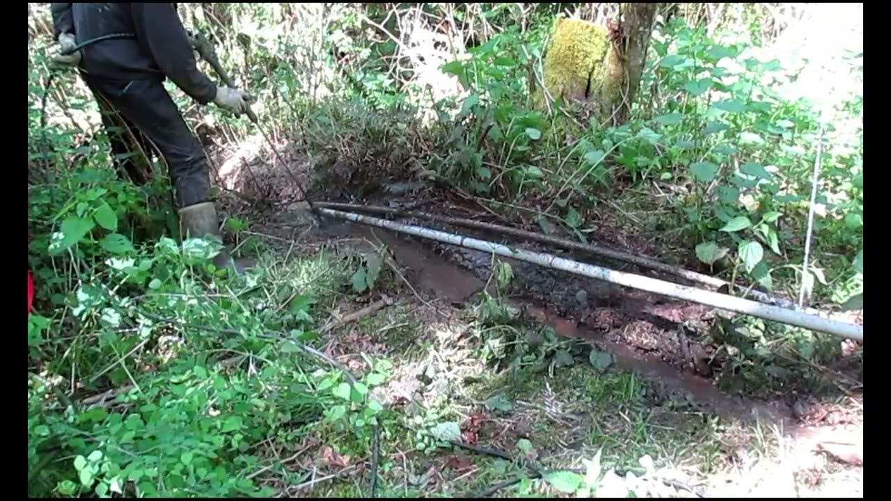 Trenching with pressure washer - YouTube