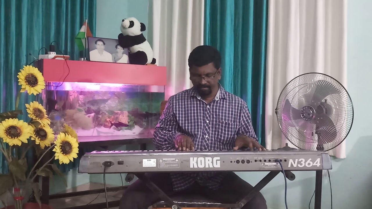 Male ninthu hoda mele in keybord suresh kunder - YouTube