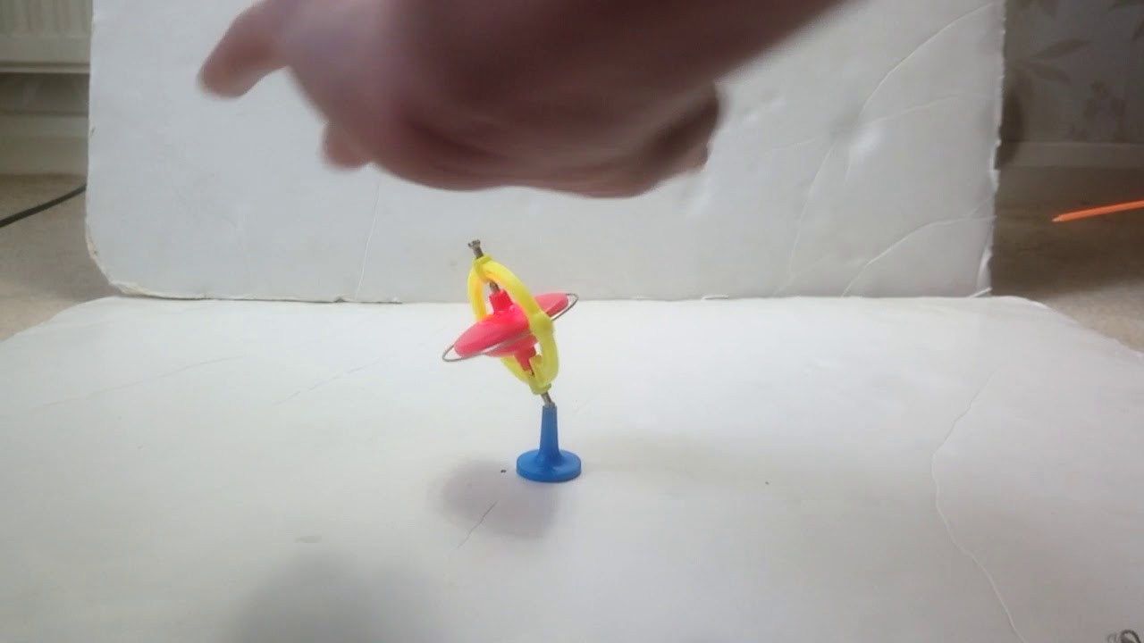 Whirling Spinning Rotating UFO Gyroscope Toy Magic Tricks - YouTube