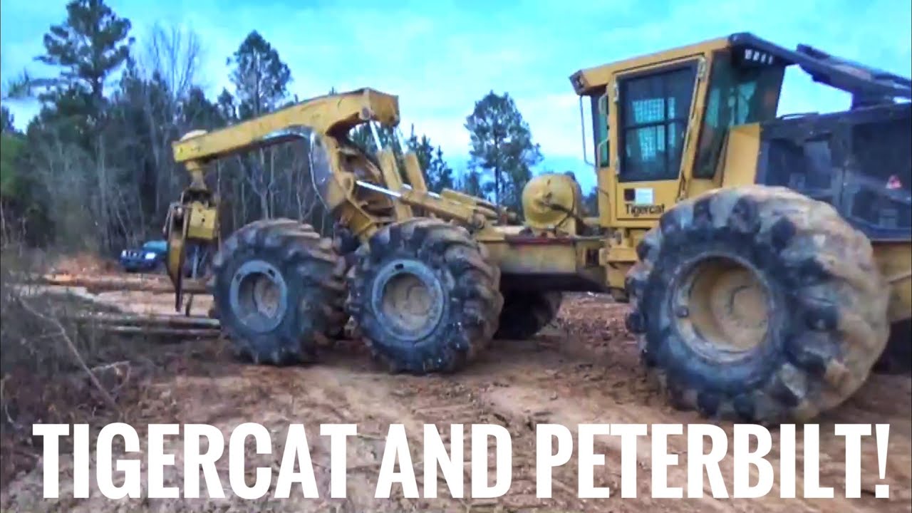 Tigercat 635d and Peterbilt log truck - YouTube