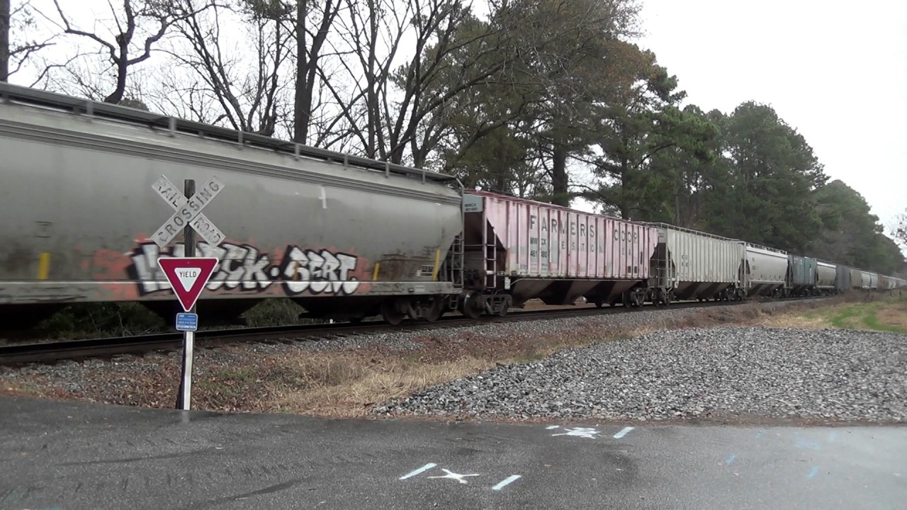 CSX 8600 (EMD SD50) trails CSX Grain on Portsmouth Sub. - YouTube