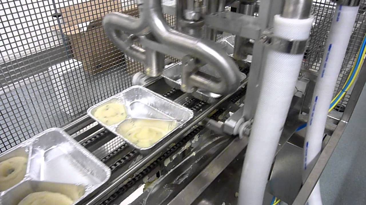 Doseren van aardapelpuree / depositor for mashed potatoes with ...