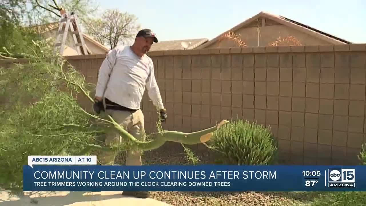 Community clean up continues after storm - YouTube