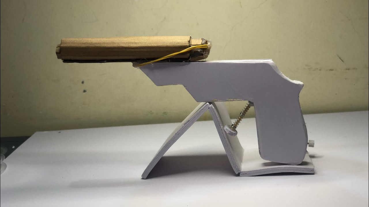 HOW TO MAKE CARDBOARD GUN POWERED RUBBERBAND /MARBLE SHOOTING GUN TOY ...