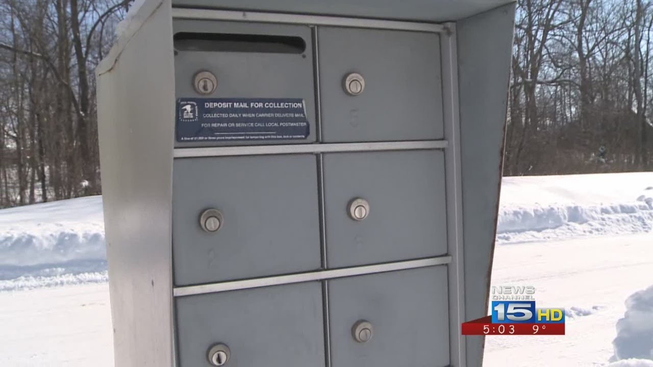 Snow packed mailboxes make it difficult for carriers to deliver mail ...