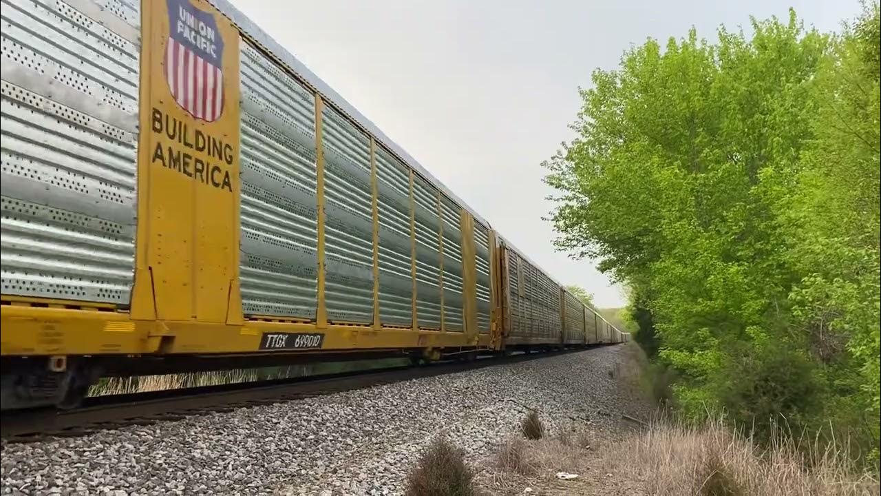 Chessie Locomotive Leads 2 CSX Locomotives While Pulling This AutoRack Down The Tracks - YouTube