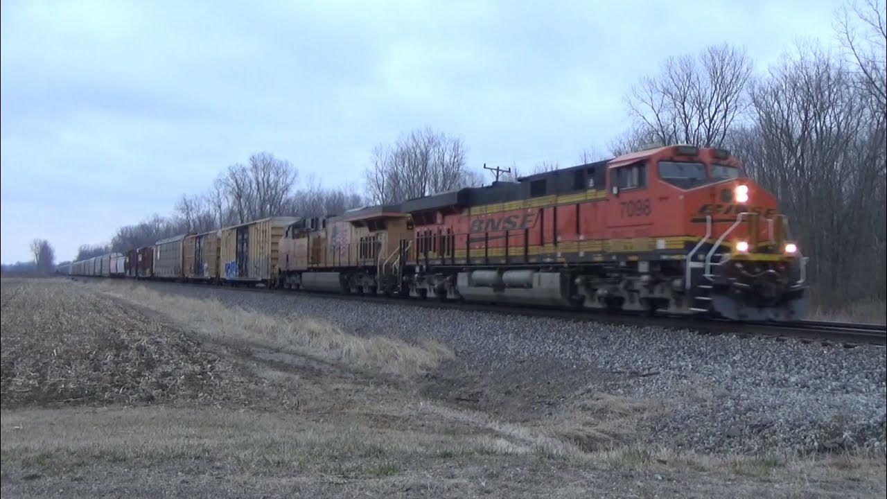 NS 121 with a BNSF & UP GEVO for power in Milan, MI - YouTube