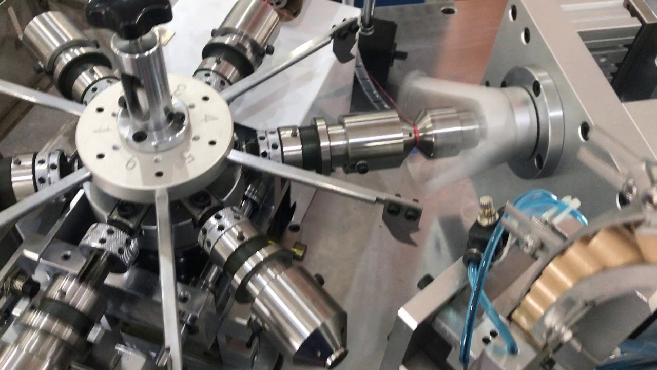 Speaker voice coil winding machine - YouTube