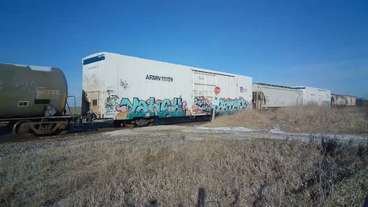 Northbound UP train with graffiti on the Spine Line - YouTube