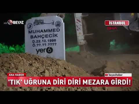 Daha çok izlenmek için mezara girdi!