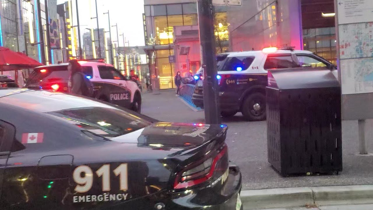 Vancouver police, Transit Police arriving at a Canada Line Station to ...