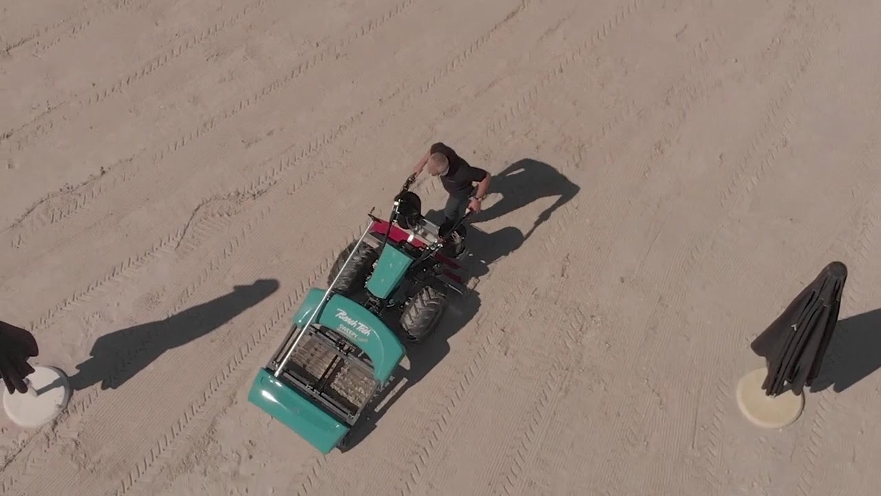 Cleaning a beach club | BeachTech Sweepy Hydro | Walk behind beach ...