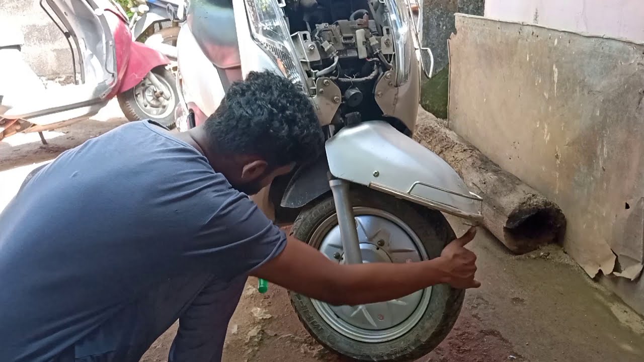 access 125 mudguard level - YouTube