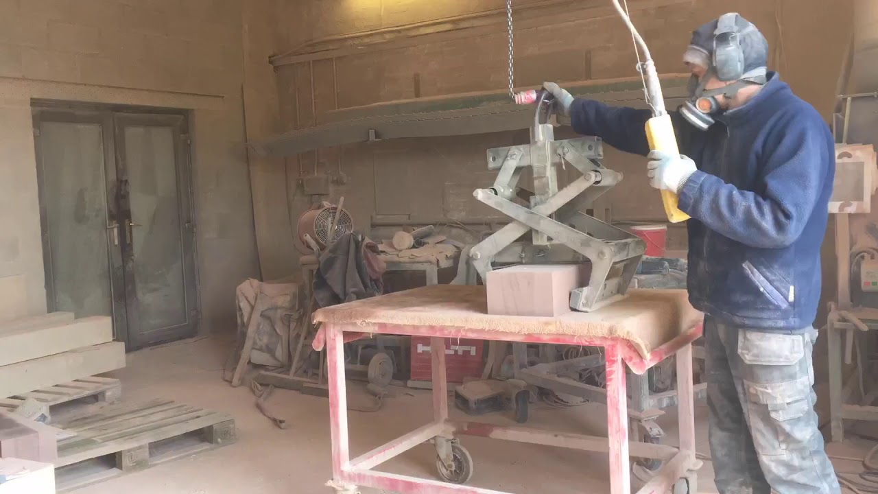 How stone mason makes a natural sandstone plinth course - YouTube