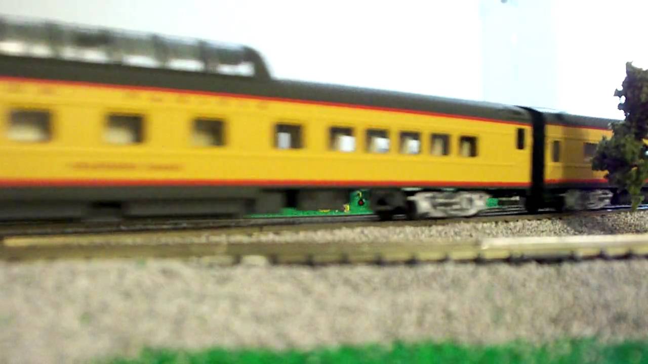 4449 and 844 doubleheader modeled in HO scale with excursion cars 4449 on the point - YouTube