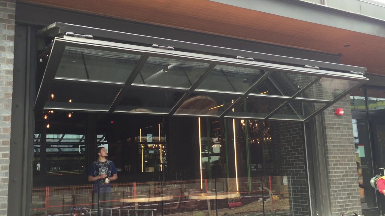 QC Installations - Hydraulic Bi-Fold Door In Action - YouTube