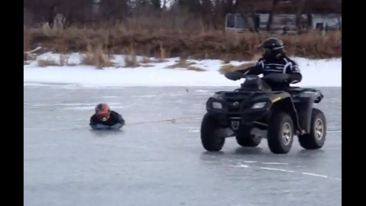 Sleds and Skates Behind Atv on Frozen River - YouTube