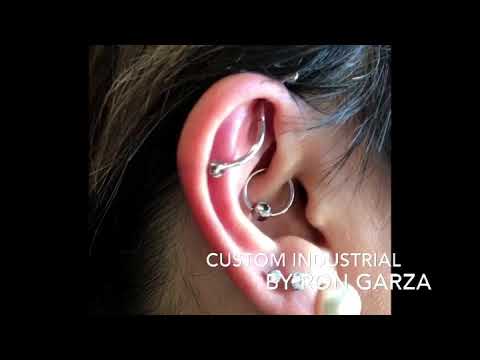 Custom semi floating industrial piercing by Ron Garza - YouTube