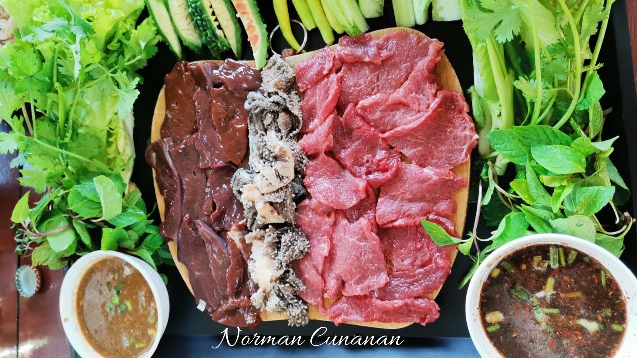 EATING RAW BEEF, INTESTINES AND LIVER | LAO FOOD - YouTube