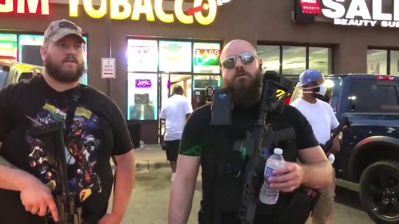 Only in the USA: Heavily armed rednecks guarding residents against ...