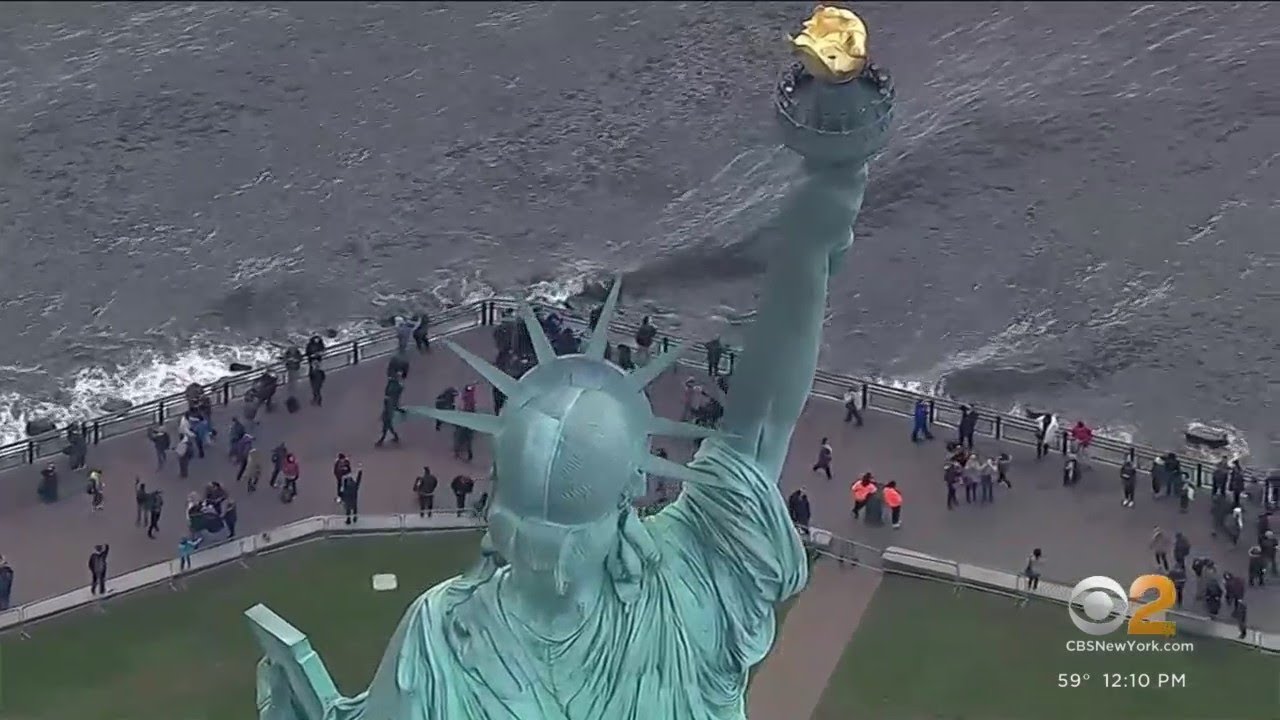 Statue of Liberty welcomes people back into crown - YouTube