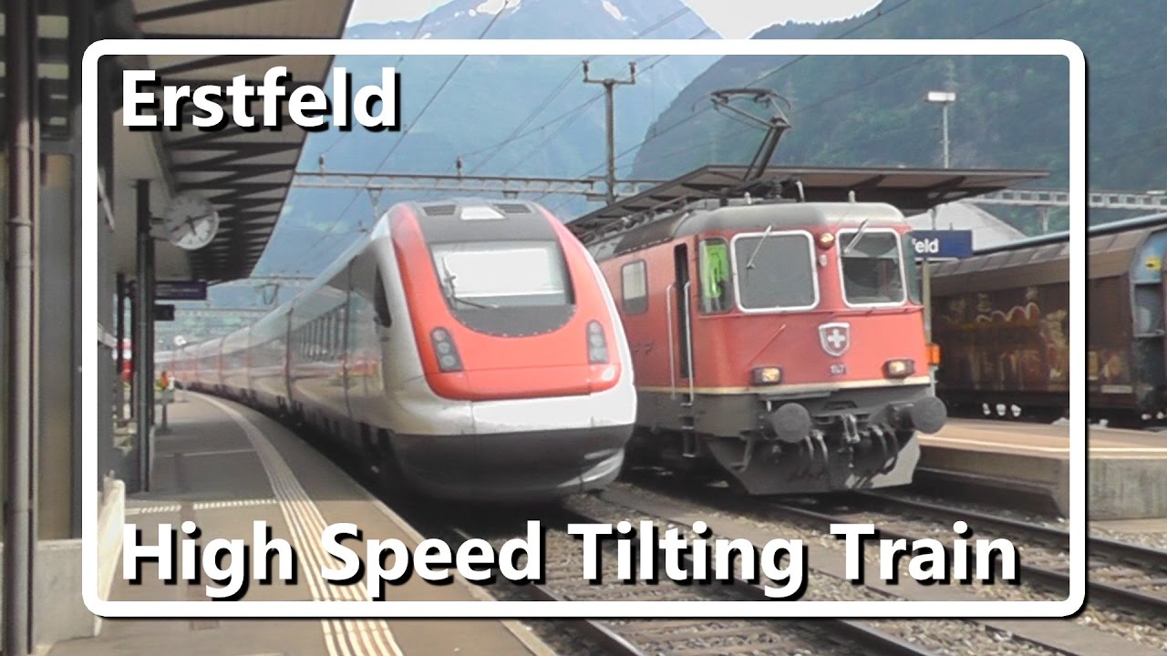 High Speed Tilting Train comes through Erstfeld! - YouTube