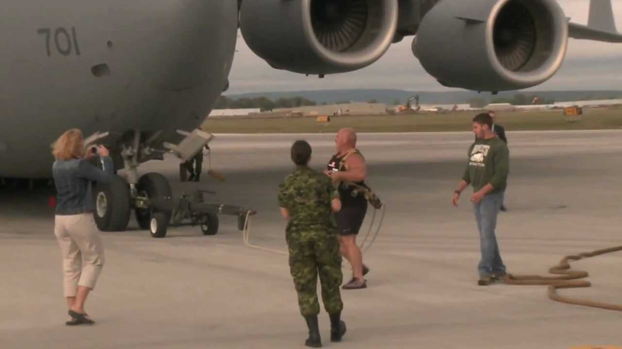 World's Strongest Man Pulls a C-17 Cargo Plane.mp4 - YouTube