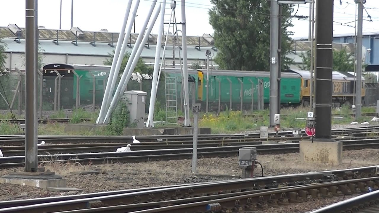 GBRf 66719 hauling Brand New Ex-Class 508 Barrier Wagons at Doncaster ...