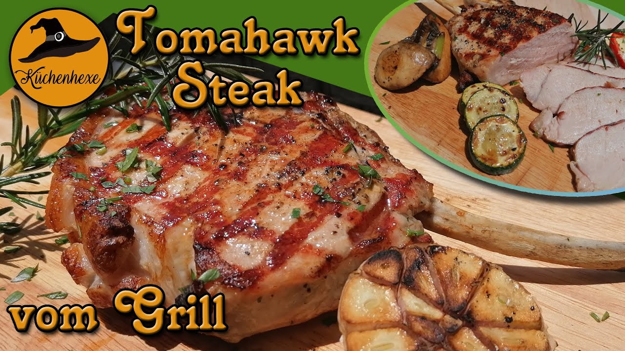 Saftiges Tomahawk Steak vom Iberico Schwein , gegrillt , mit gefüllten ...