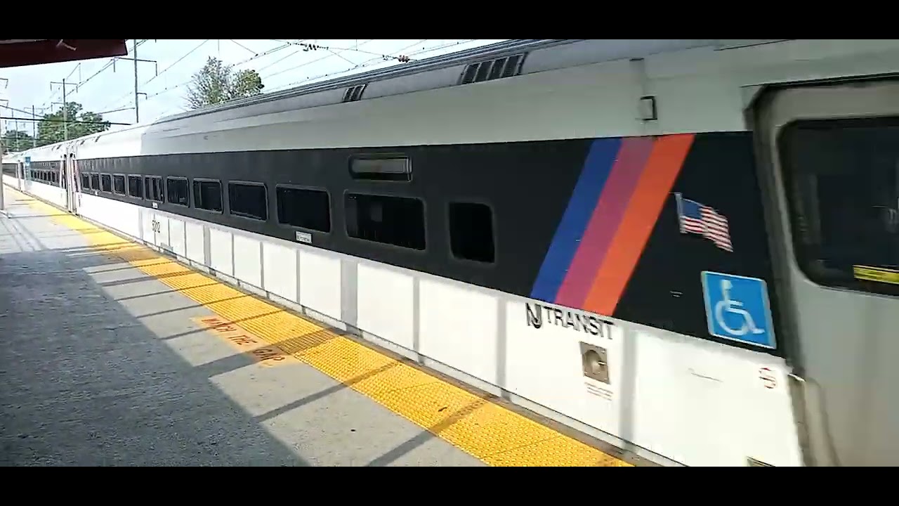 NJT 4533 leads a passenger train trough Elizabeth station - YouTube