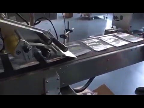 Plastic bag sticker labeling machine: high speed bag labeling machine ...