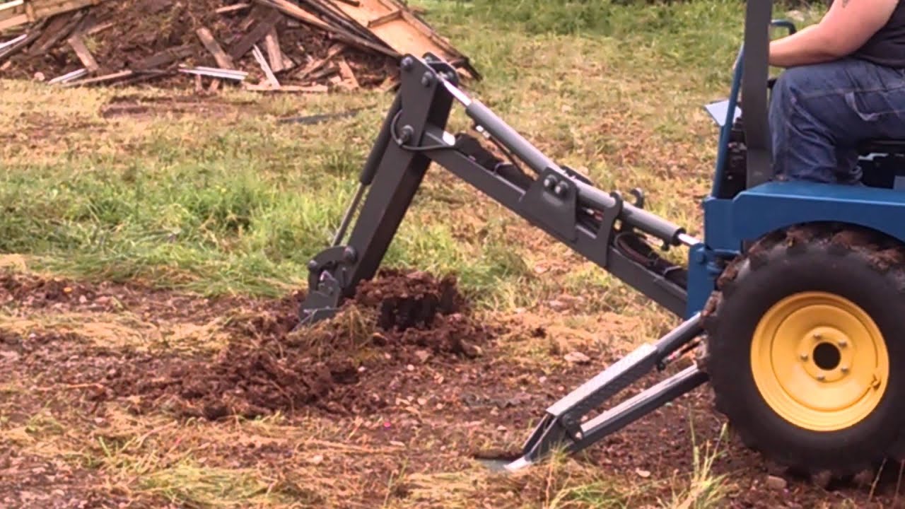 Terramite backhoe in action 02 - YouTube