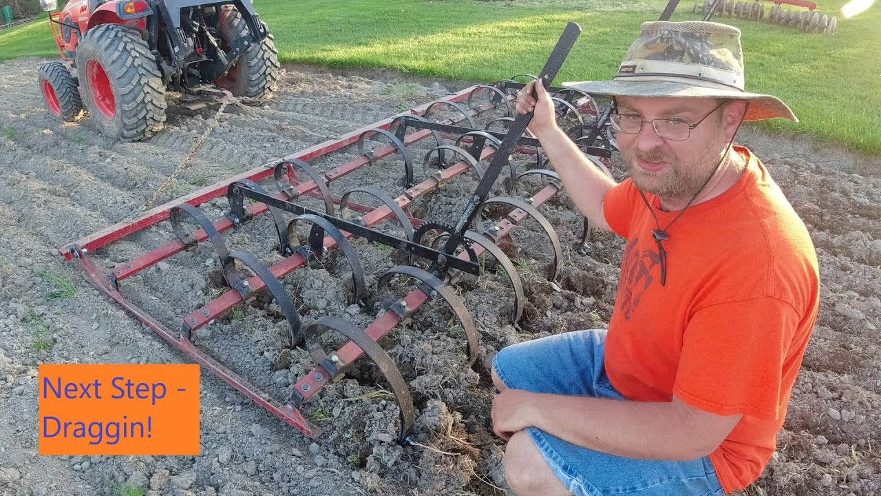 #24 Antique 12 foot spring drag harrow behind the Kioti ck3510se - YouTube