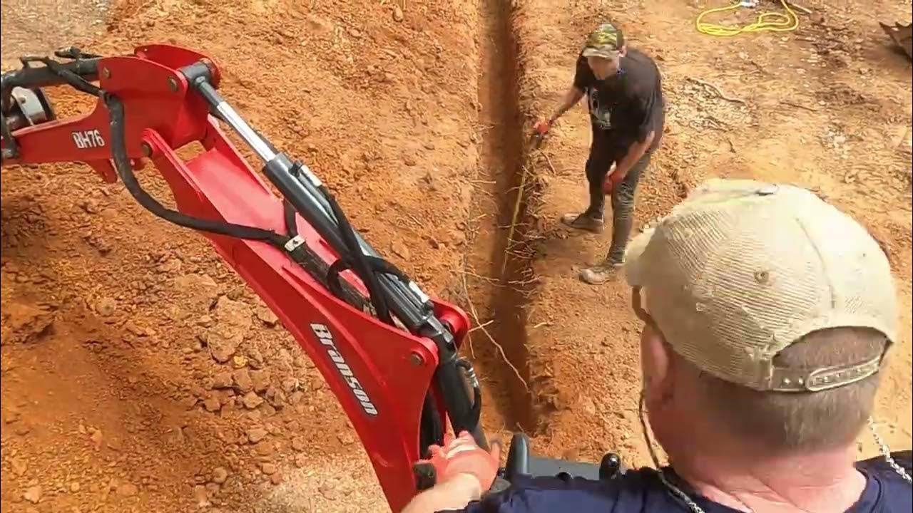 Digging the electrical service trench - YouTube