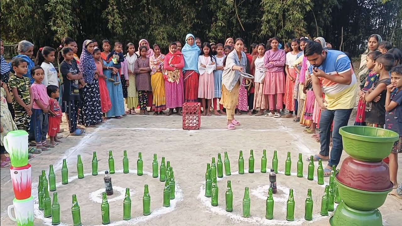 The challenge of #hitting the center of the bottle through the ring # ...