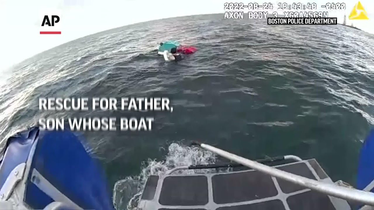 Police rescue men after boat sinks off Boston - YouTube