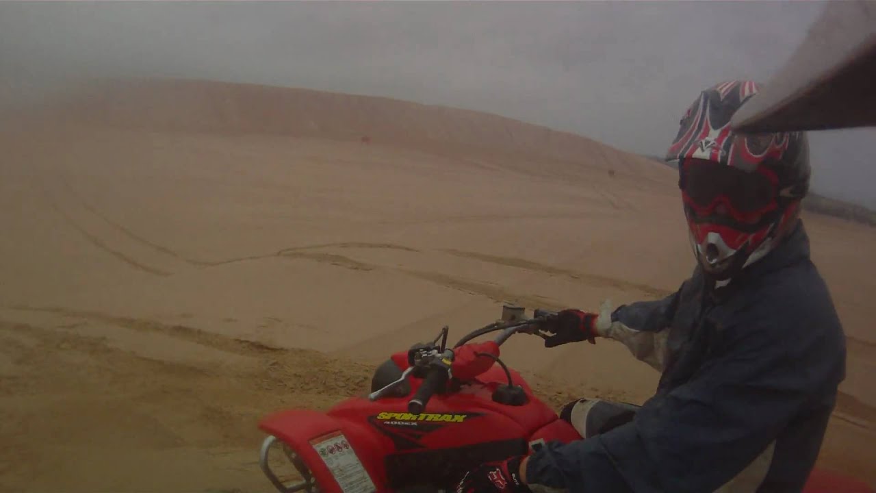 ATVs jumping at Silver Lake Michigan - YouTube