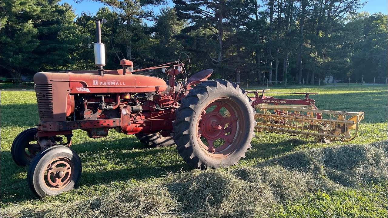 Raking hay 1950’s style - YouTube