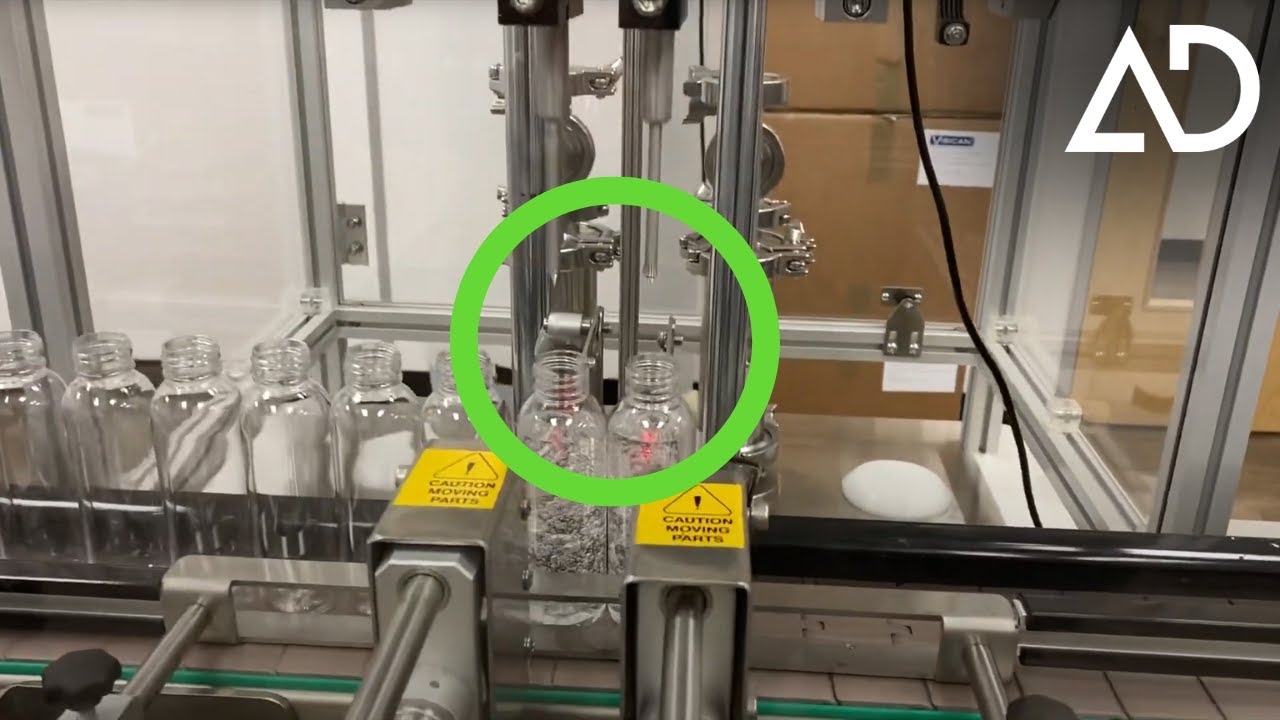 Hand Sanitiser Being Automatically Filled On A Production Line ...