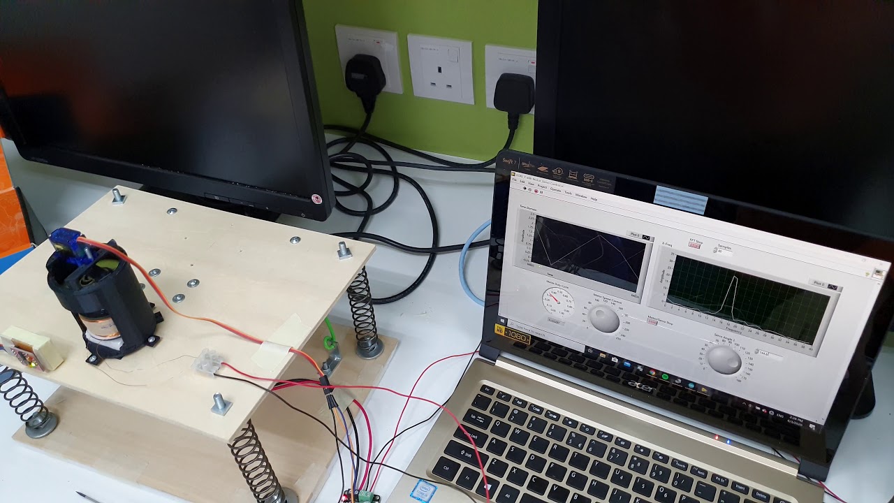 Single spring setup vibration energy harvester - YouTube