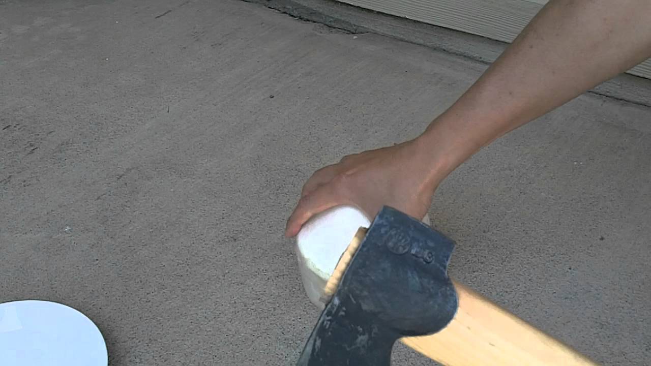 Opening a Coconut with an Axe - YouTube
