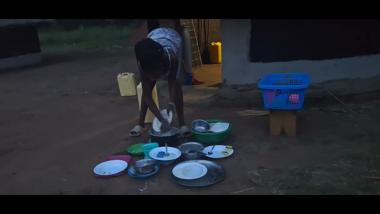 Washing utensils in the evening hours // African village life - YouTube
