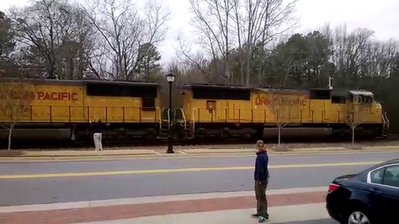 Union Pacific Freight Train passing Trainmaster Hobbies in Buford ...